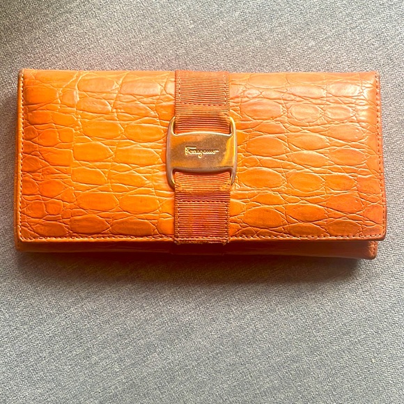 Salvatore Ferragamo | Bags | Used Condition Ferragamo Peach Trifold ...